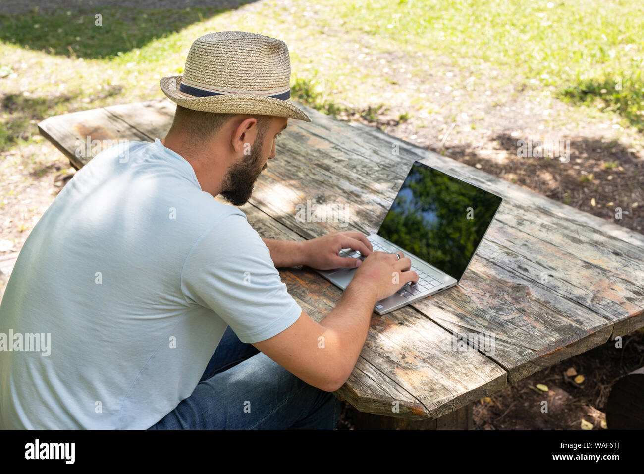View back of man computer screen hi-res stock photography and images ...