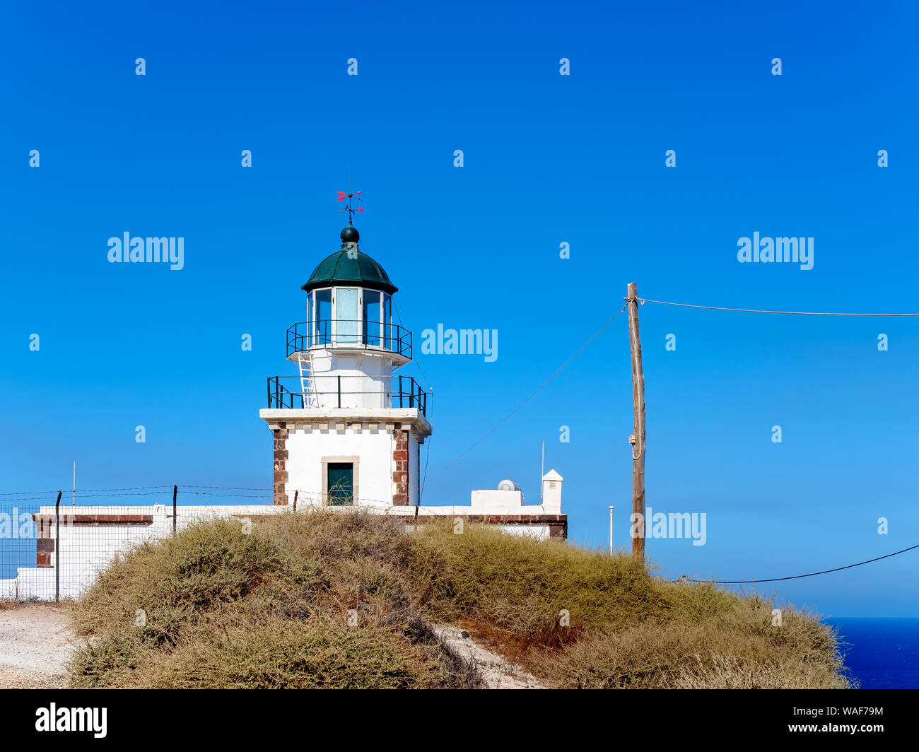 Akrotiri Lighthouse (Faros) with clear sky - Santorini Greece Stock ...