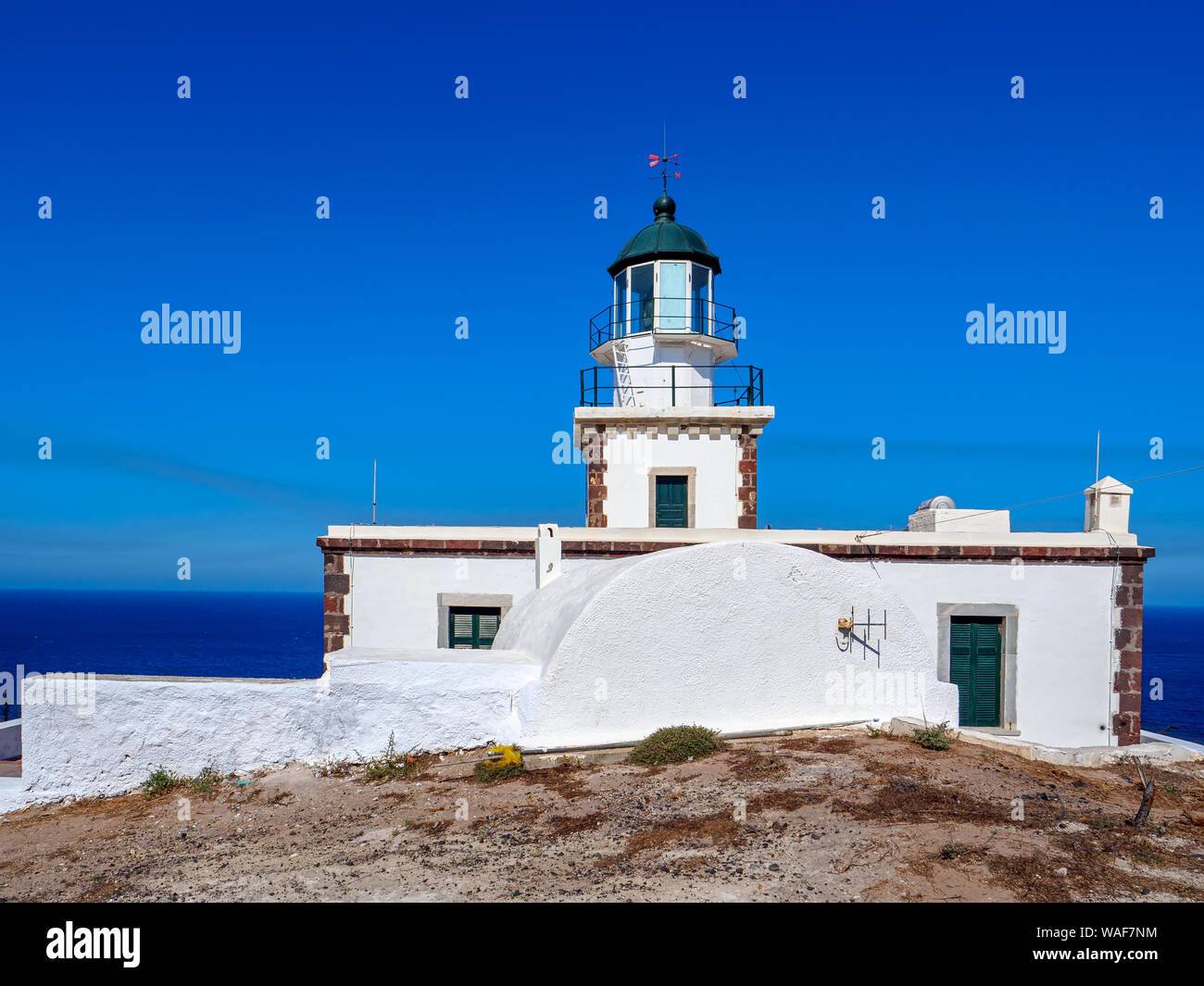 Akrotiri Lighthouse (Faros) with clear sky - Santorini Greece Stock ...