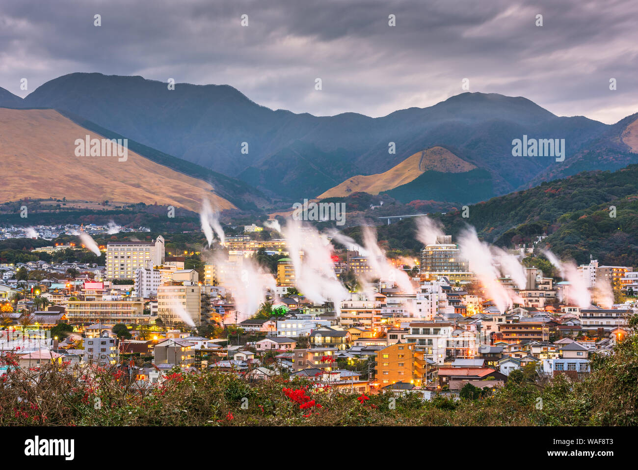 Beppu, Japan cityscape with hot spring bath houses at night Stock Photo ...