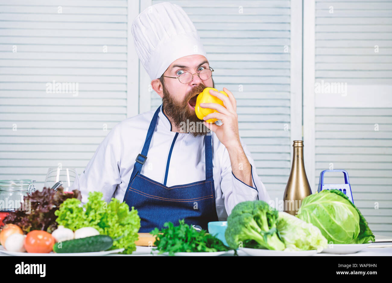 Colorful culinary. Vegetarian diet concept. Man wear apron cooking in ...