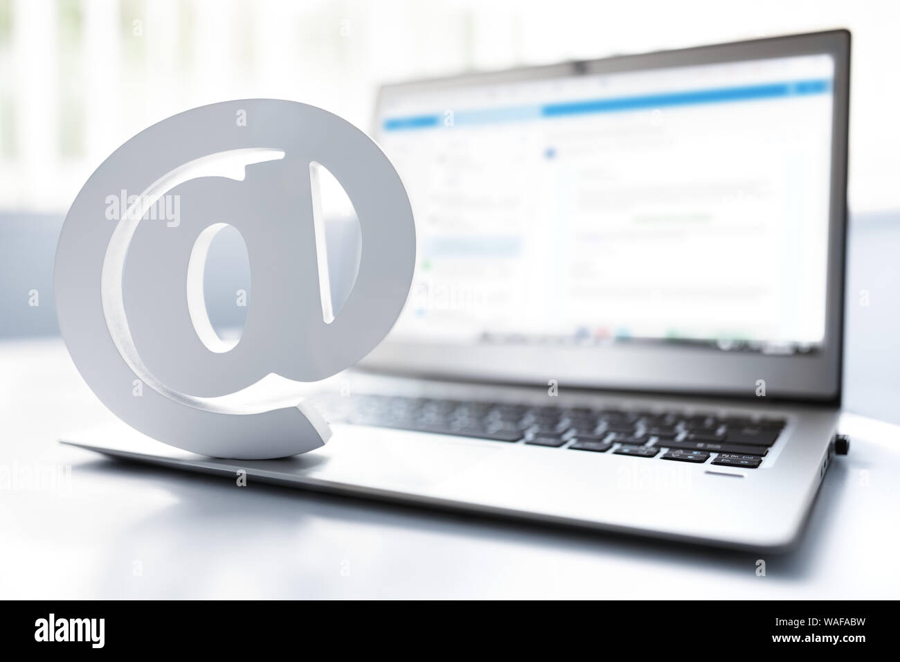 Email symbol on business laptop computer concept for internet, contact ...