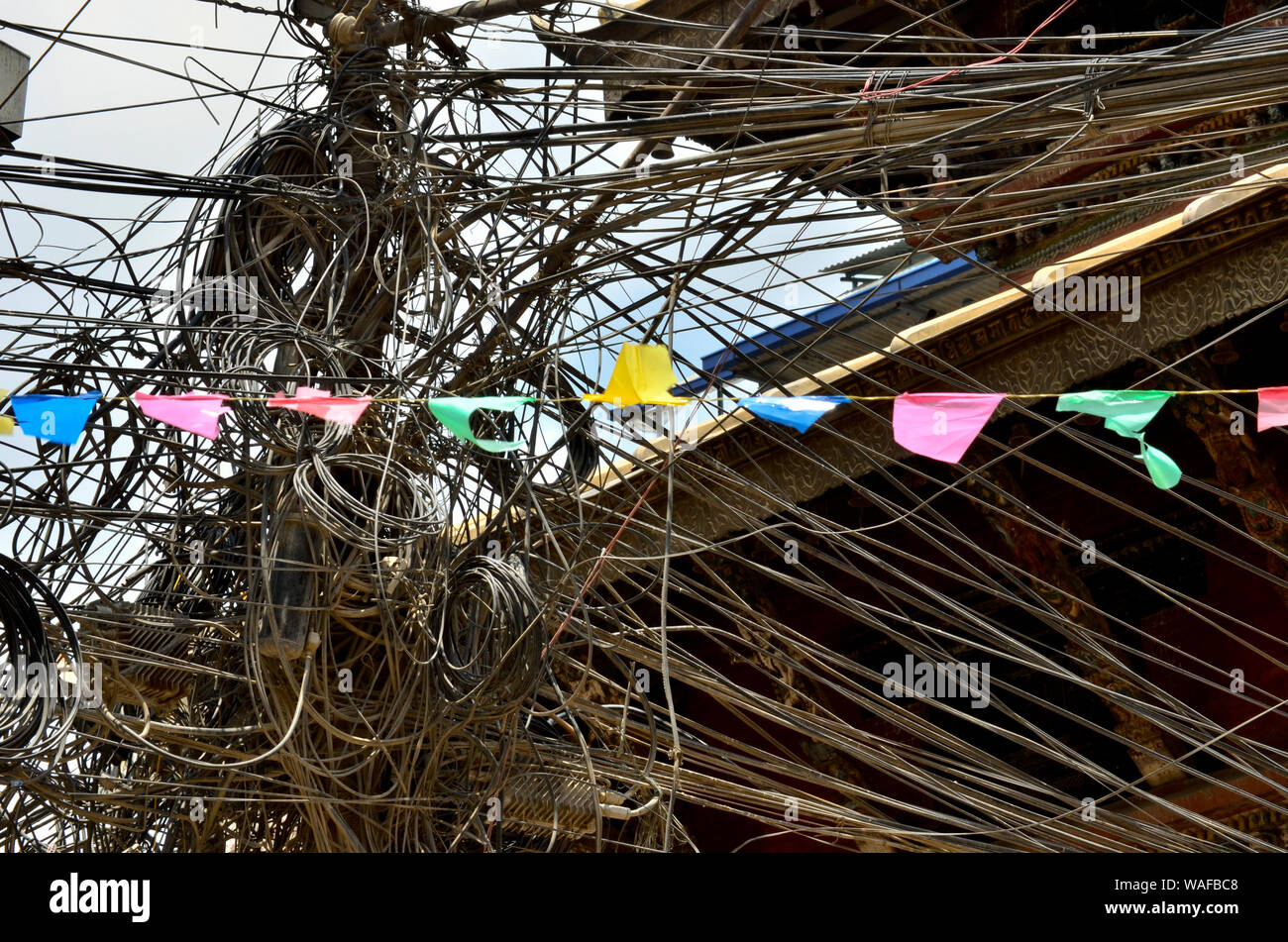 Big tangle of dirty black wires in Kathmandu, Nepal Stock Photo - Alamy