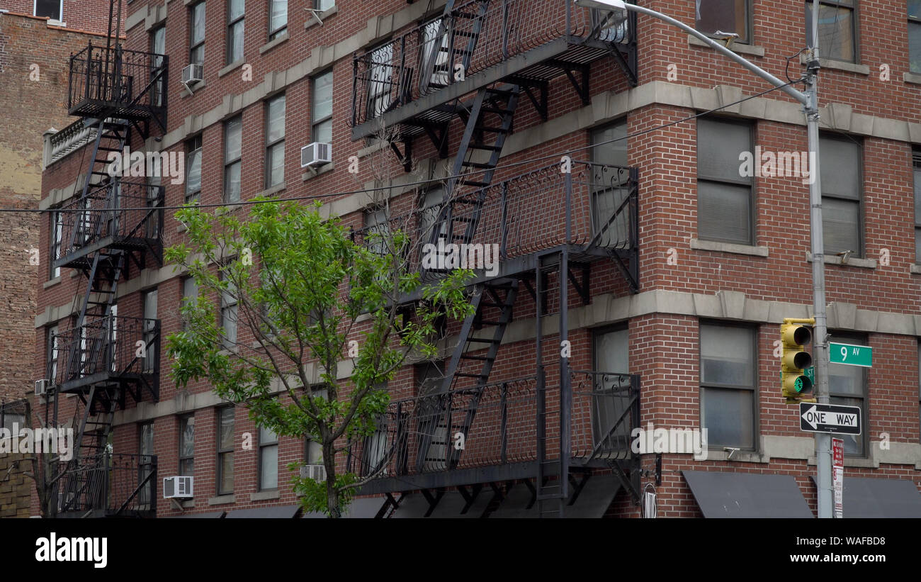 New York City style apartment building day time exterior establishing ...