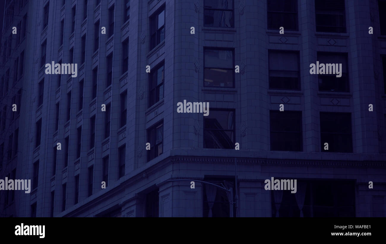 Night time establishing shot of generic typical urban city apartment or ...