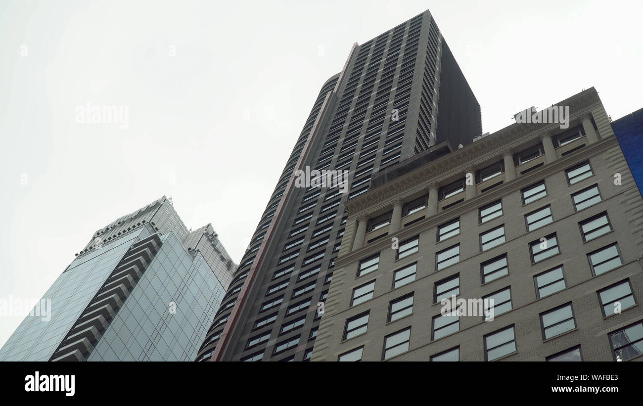 Straight up vertical view establishing shot of generic typical sky rise ...