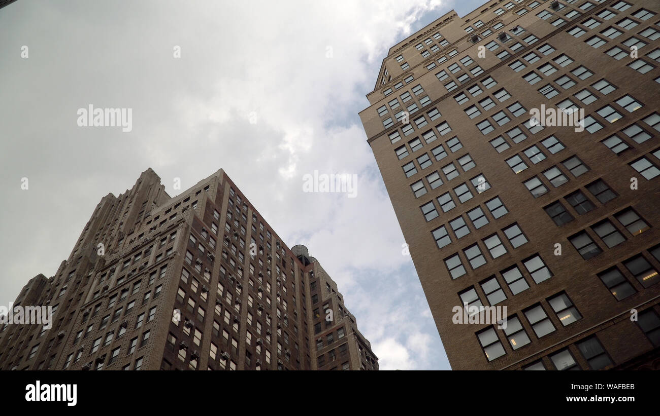 Day time exterior establishing shot looking straight up vertical at ...