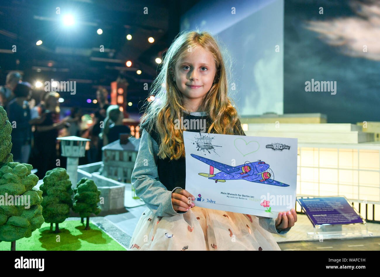 Berlin, Germany. 20th Aug, 2019. Maxima Bär shows her painted raisin ...