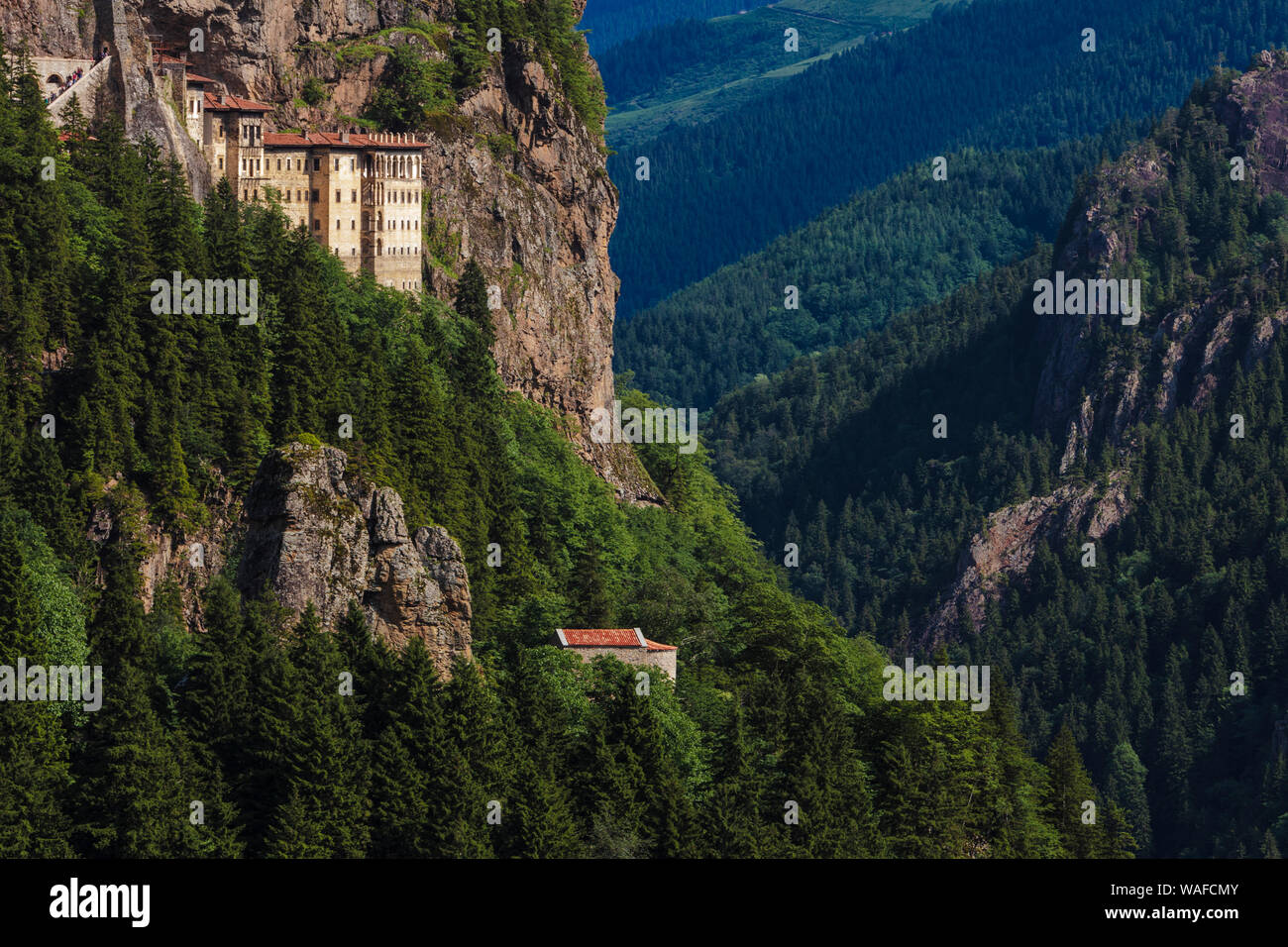 Ancient Greek monastery nestled in a steep cliff Stock Photo - Alamy