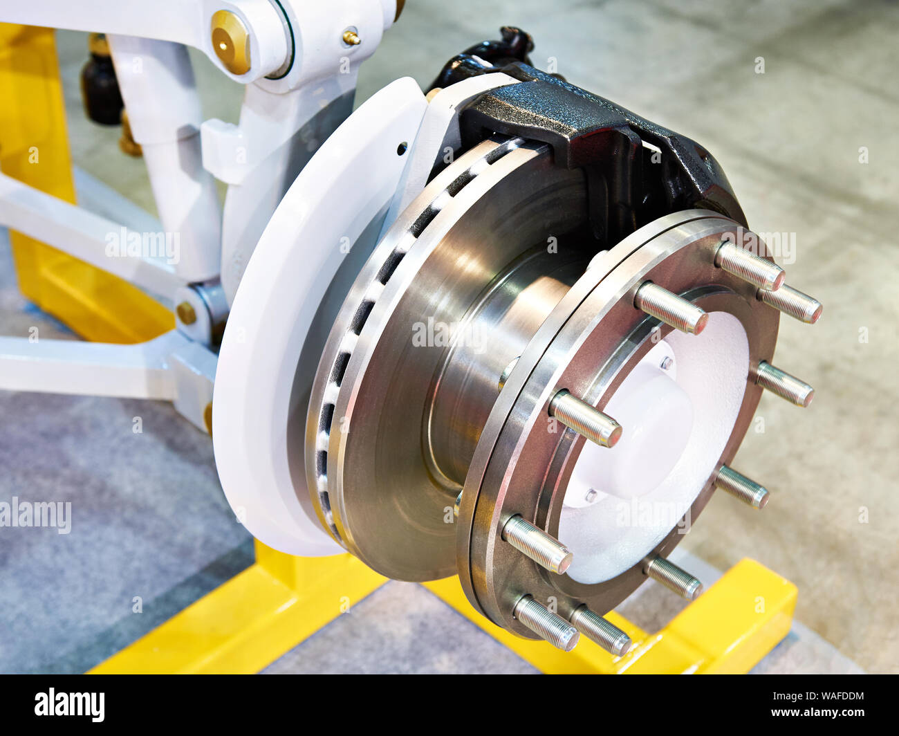 Independent front suspension and brake disc for bus on exhibition Stock ...