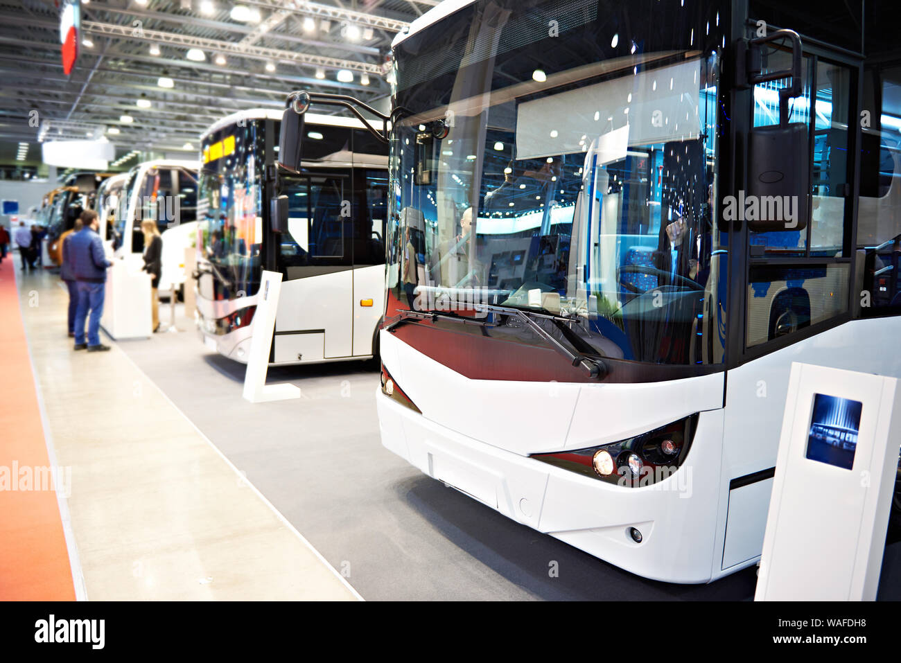 Modern buses on the exhibition Stock Photo - Alamy