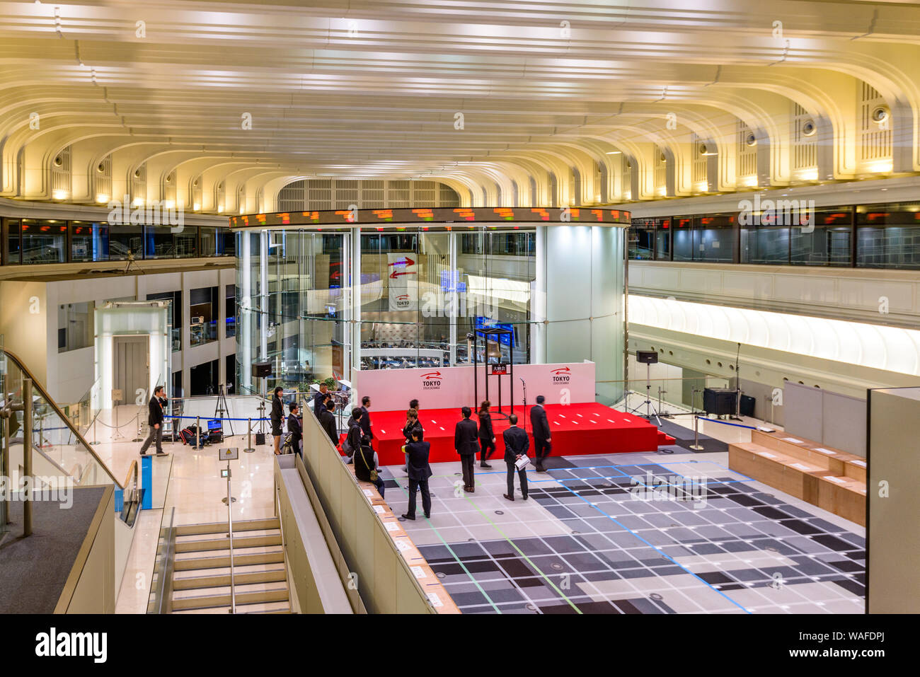 TOKYO, JAPAN - DECEMBER 28, 2012: News reporters set up inside the ...