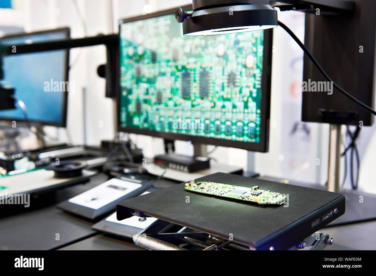 Digital microscopes with monitors from a quality control laboratory ...