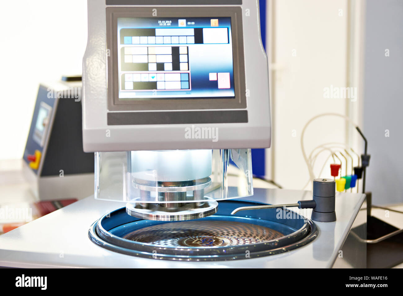 Grinding and polishing machine with automatic head Stock Photo - Alamy