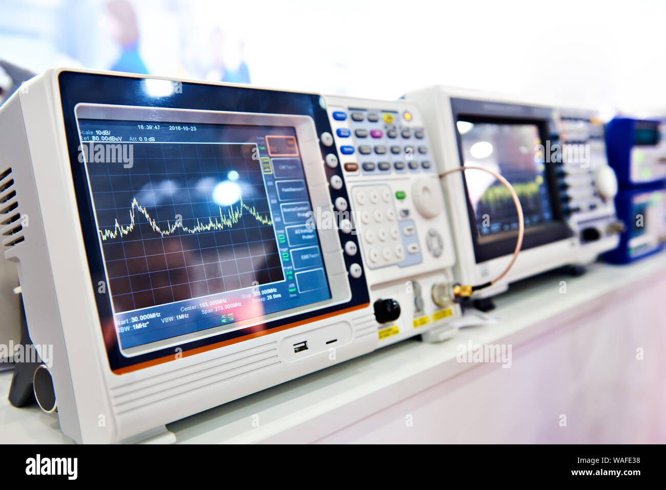 Digital spectrum analyzer and electronic devices Stock Photo - Alamy