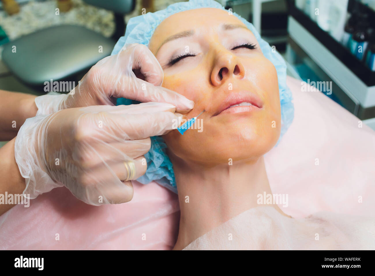 Close up of a hands threading beautiful womans upper lip Stock Photo ...