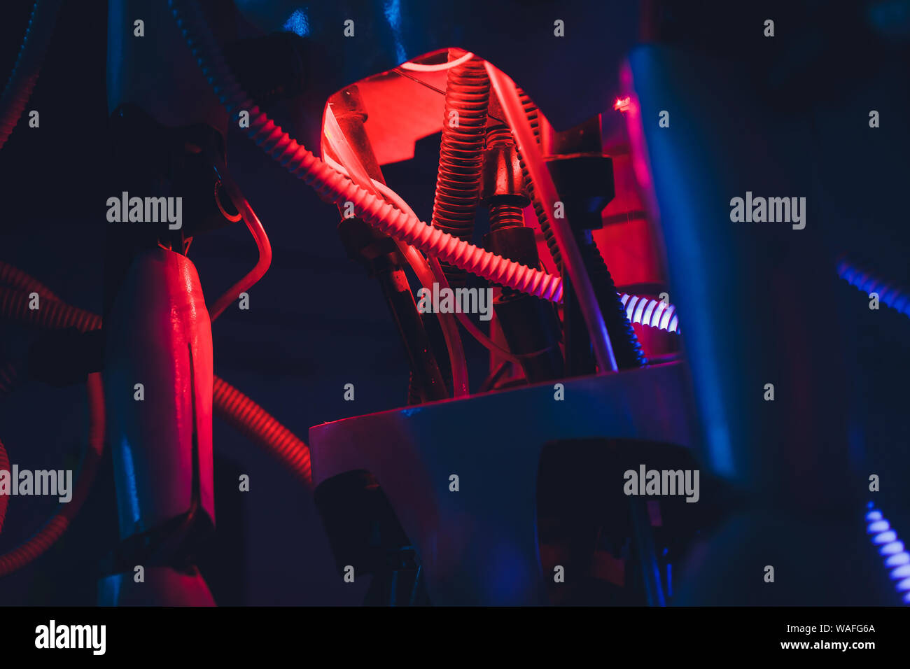 Close-up of humanoid robot head with micro-cameras eyes on blurred ...