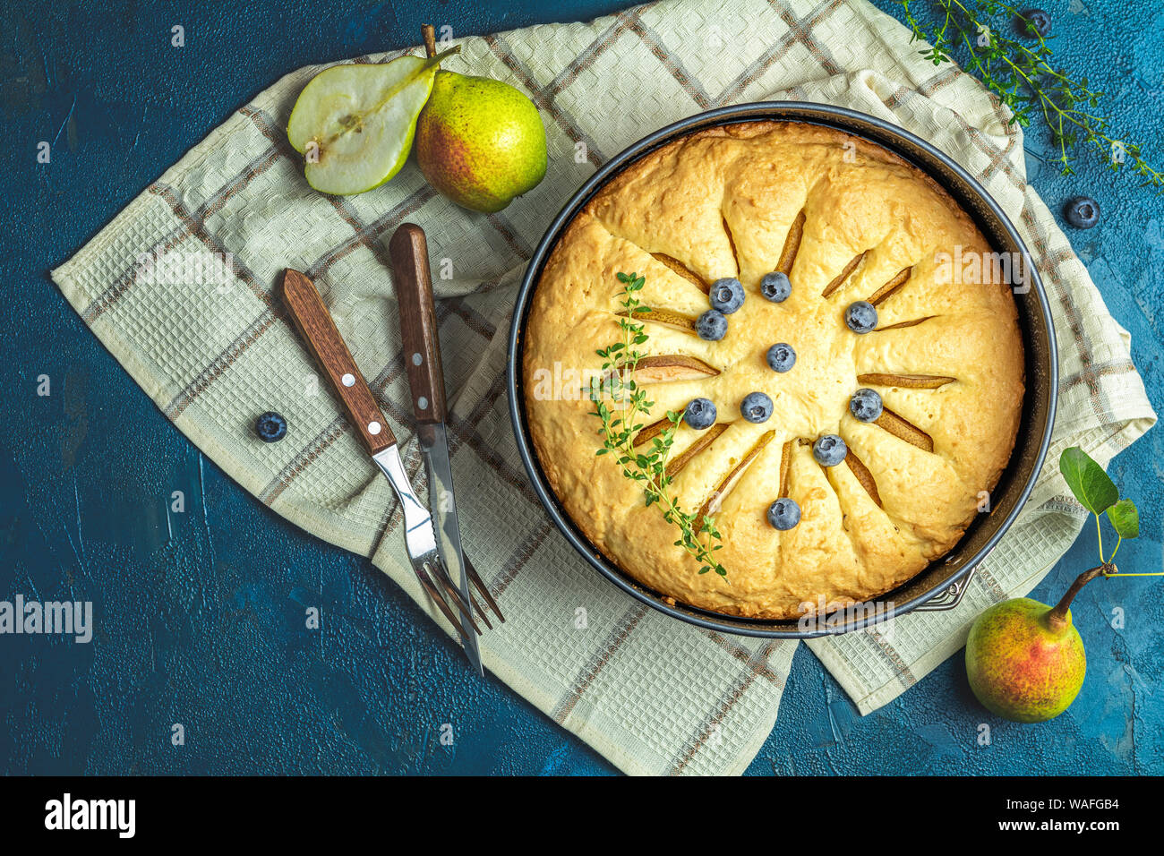 Delicious dessert blueberry tart with fresh berries and pears, sweet ...