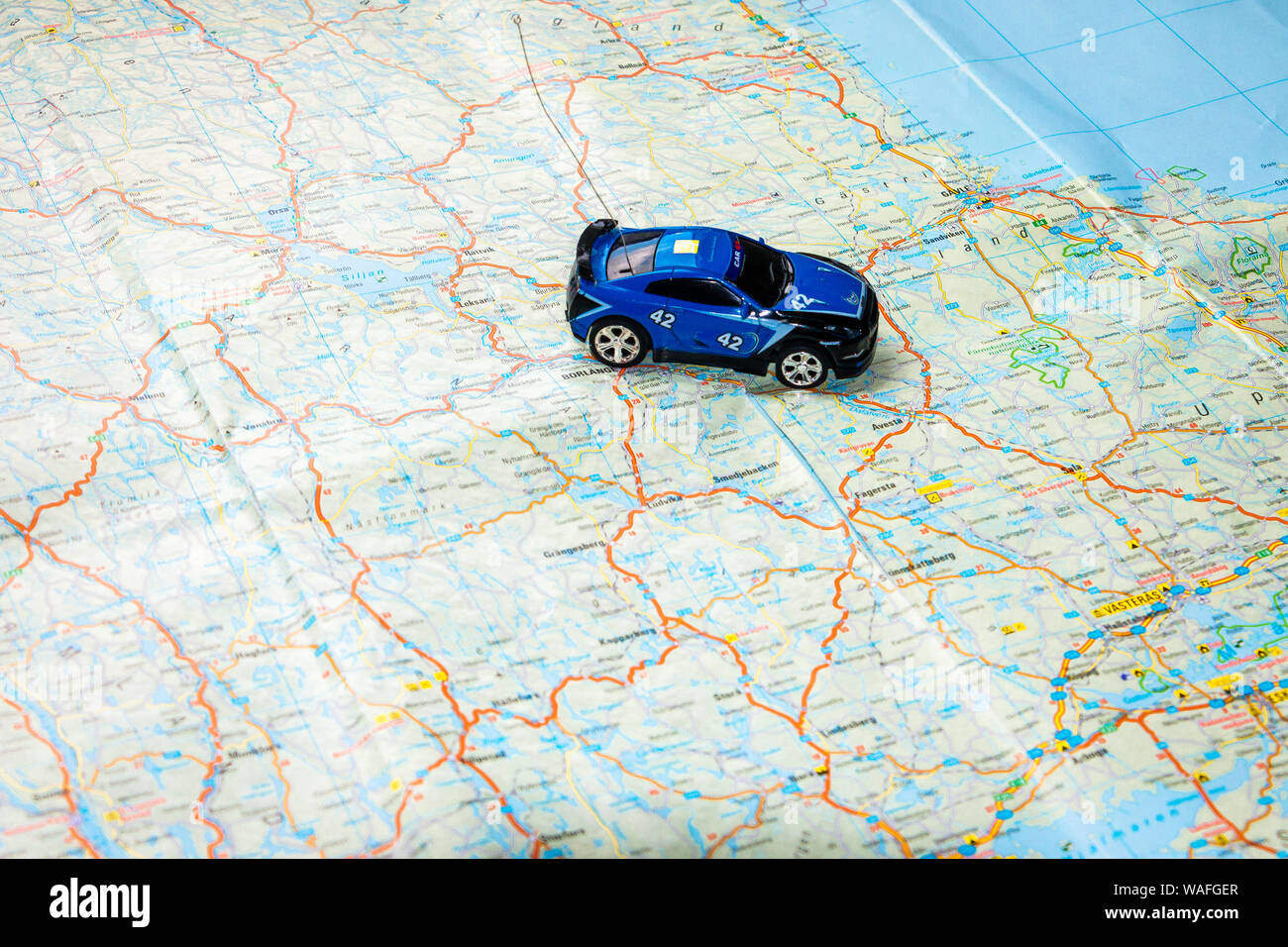 Traveling and navigate with a good old paper road map in your car to ...