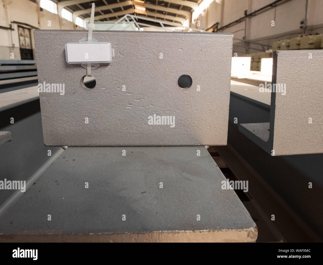 Stacked metal parts of a pre-fabricated building with blank copy space ...