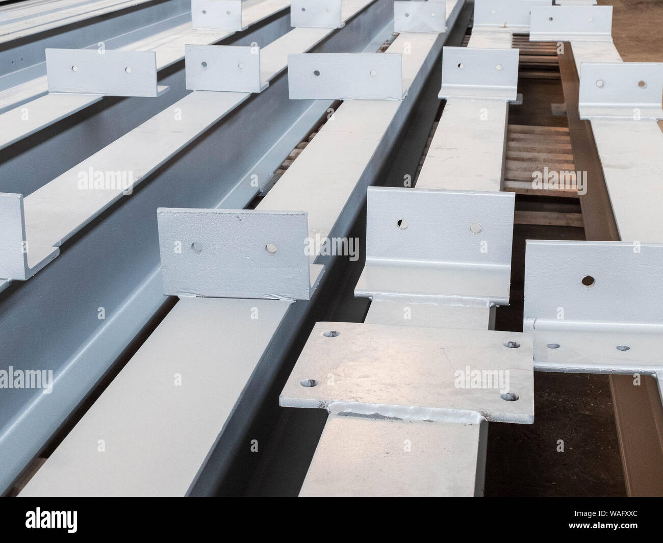 Stacked metal parts of a pre-fabricated building. Fast-built camp ...
