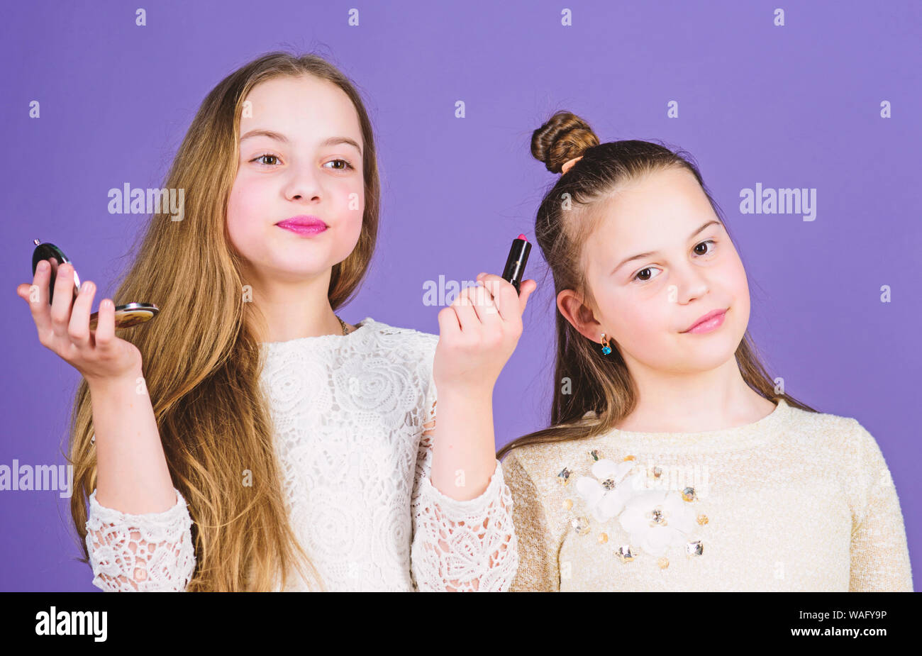 The best make up and beauty products. Make up artists holding lipstick ...