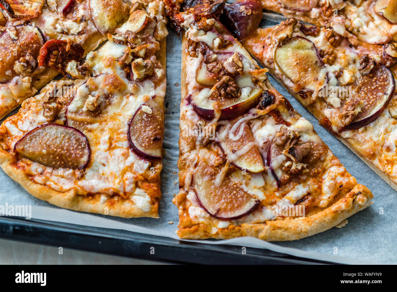 Fig Pizza with Walnut and Sun Dried Tomatoes. Traditional Organic Fast ...