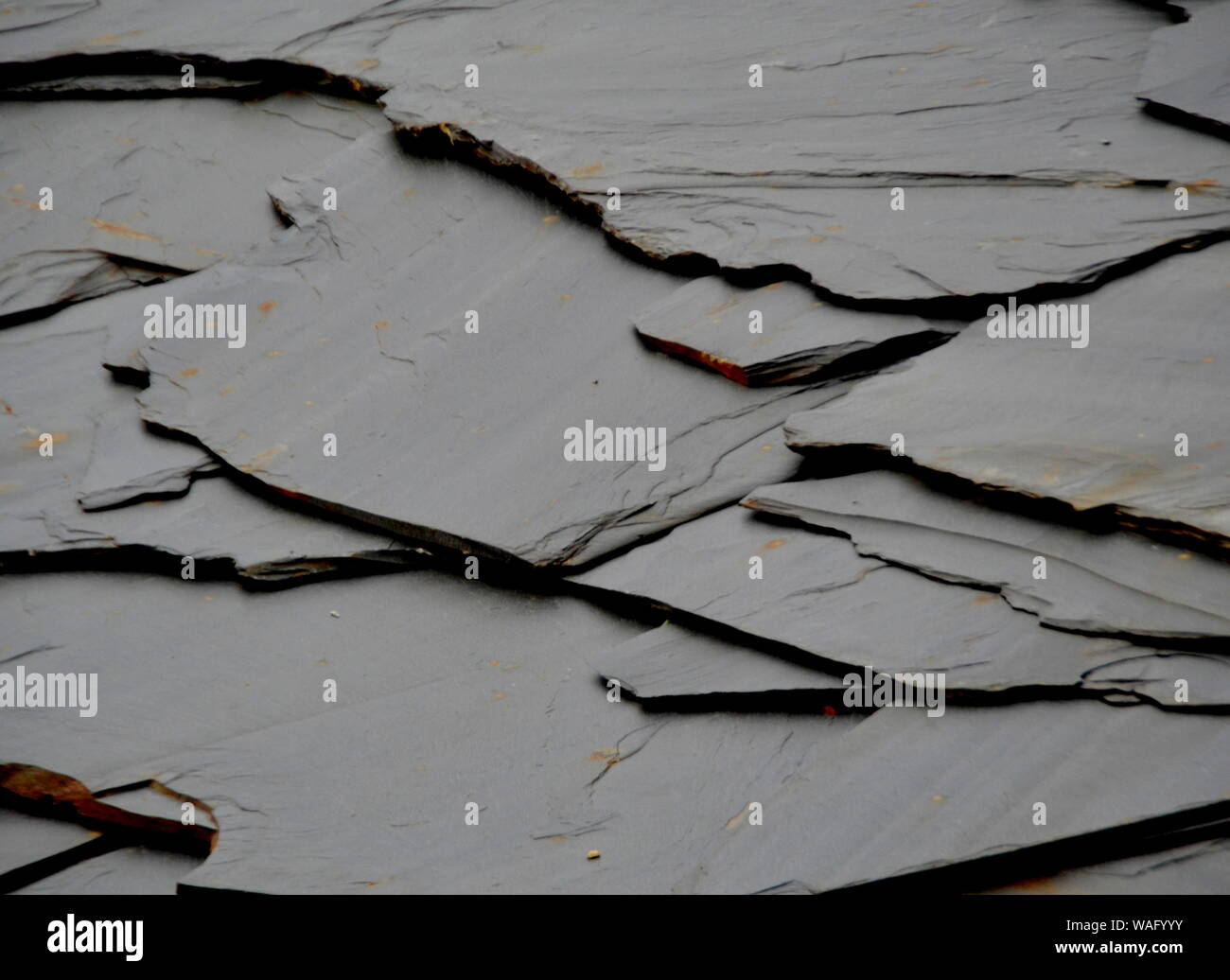Details of shale roof on a house built from schist in Piodão, one of ...