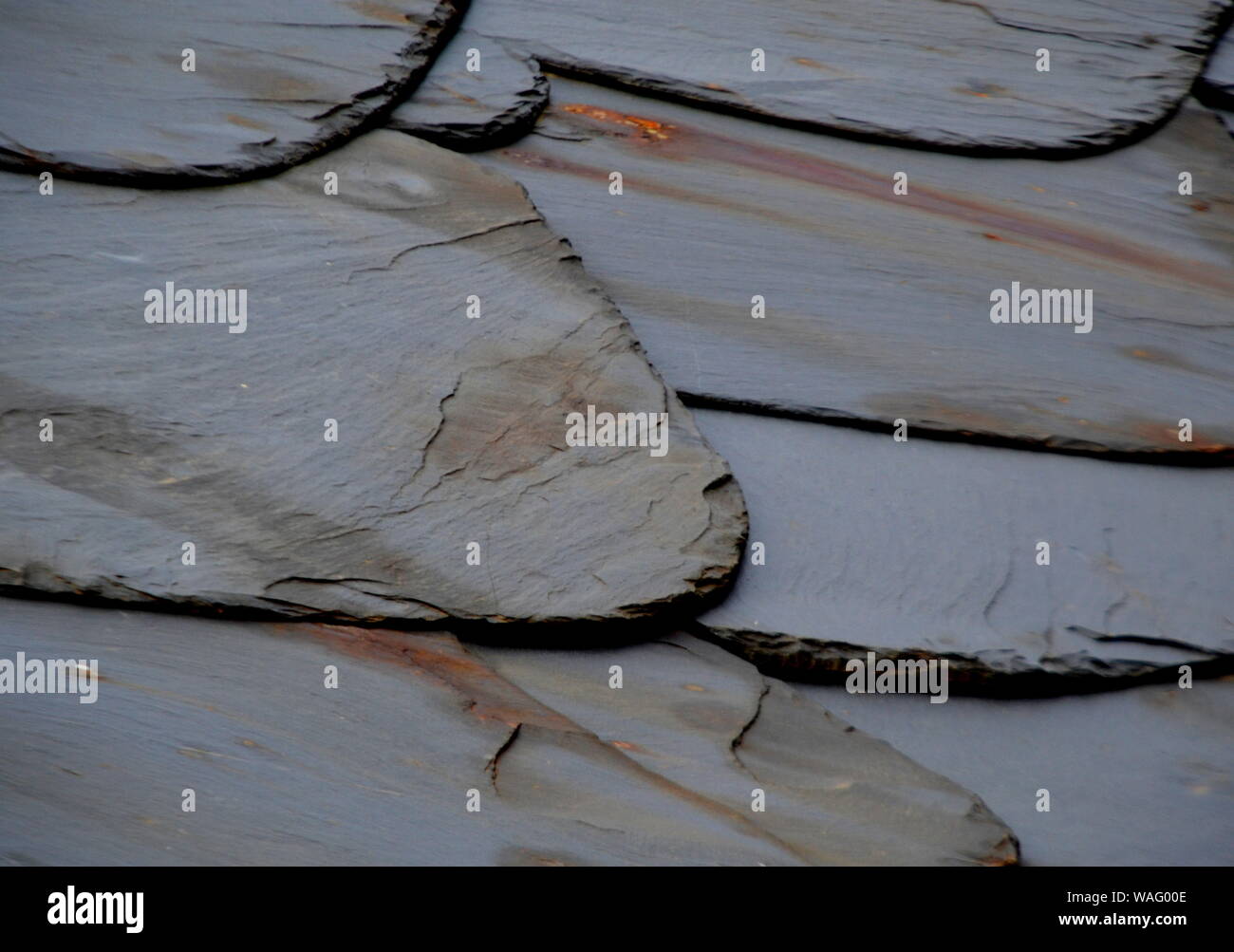 Details of shale roof on a house built from schist in Piodão, one of ...