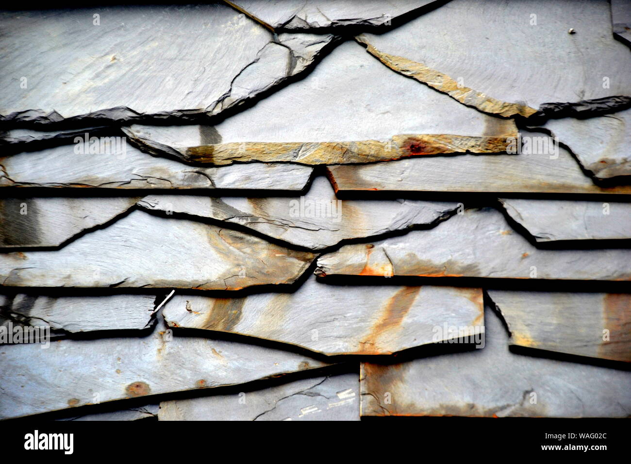 Details of shale roof on a house built from schist in Piodão, one of ...