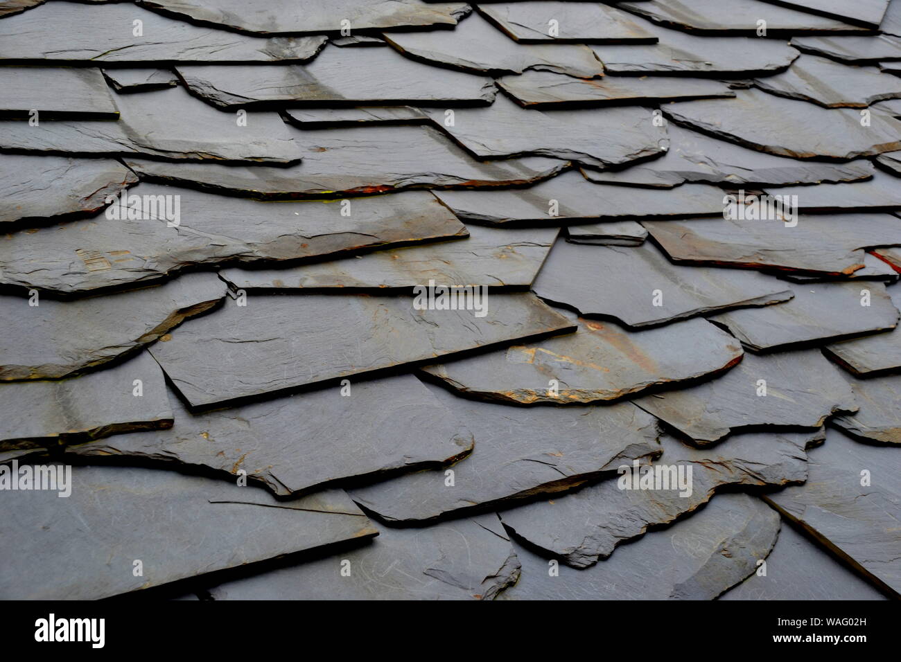 Details of shale roof on a house built from schist in Piodão, one of ...