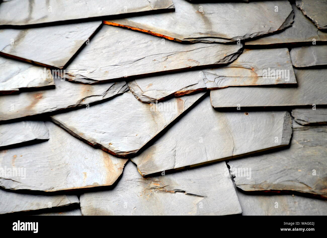 Details of shale roof on a house built from schist in Piodão, one of ...