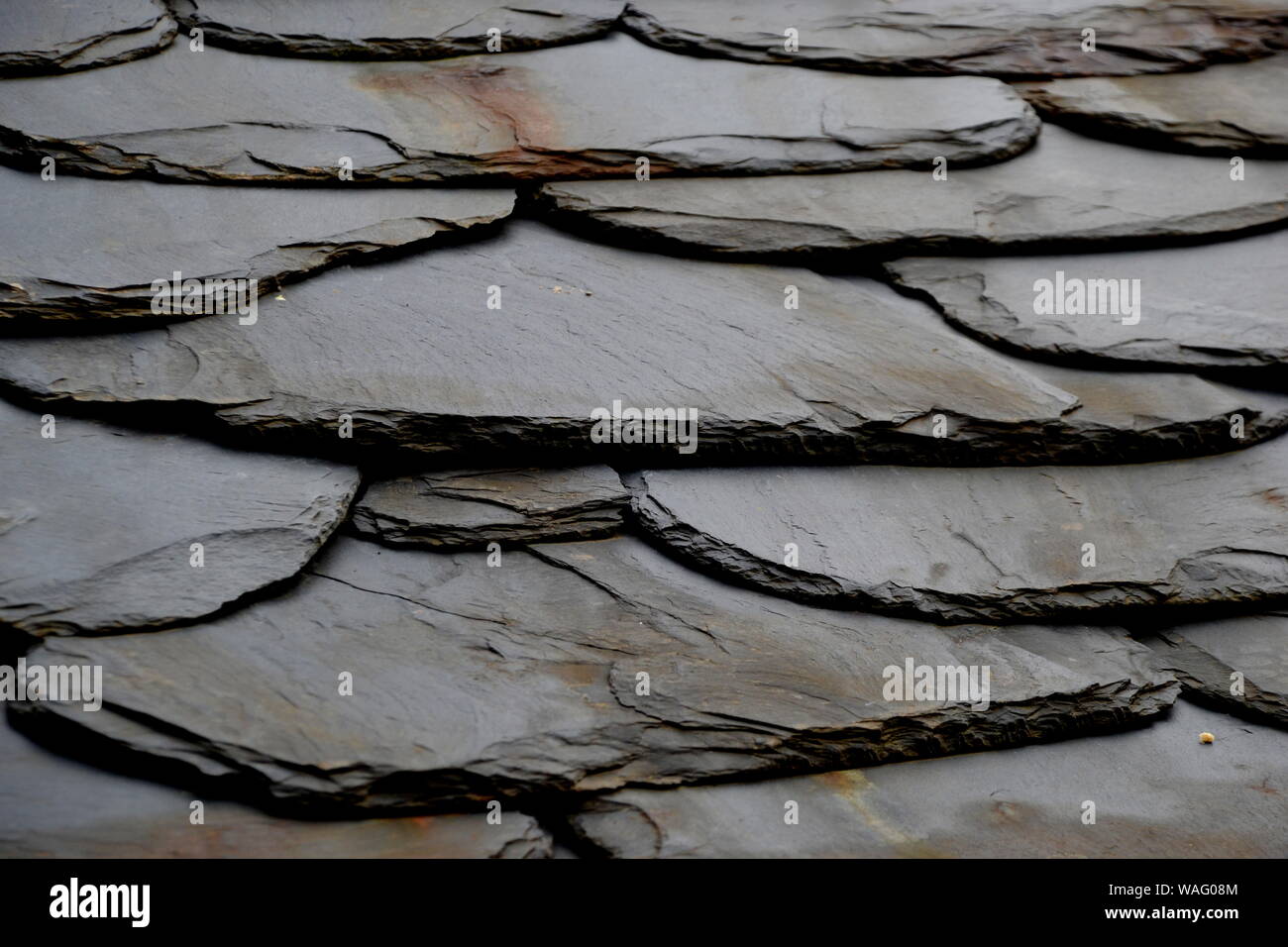 Details of shale roof on a house built from schist in Piodão, one of ...