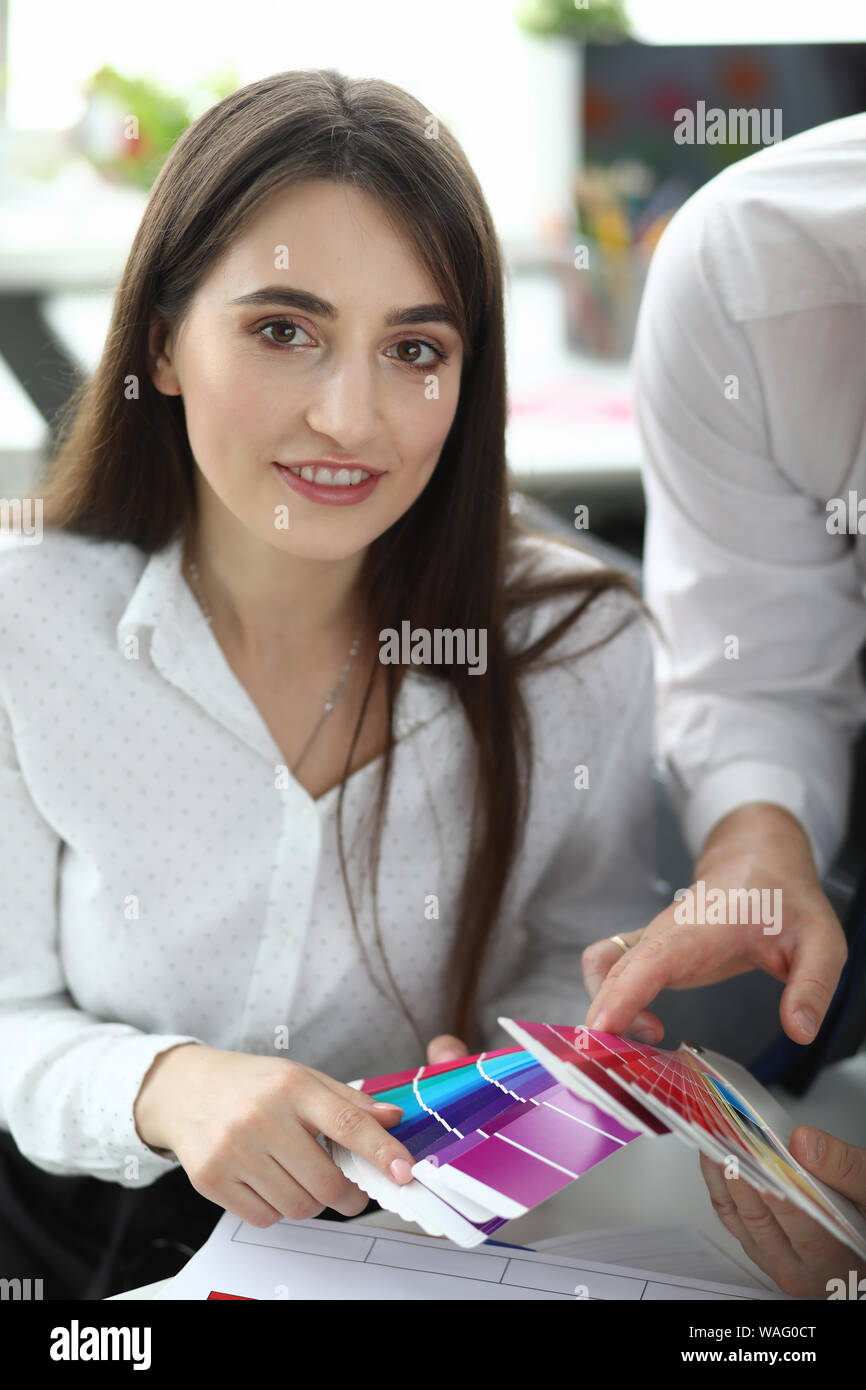 Pretty female art worker Stock Photo - Alamy
