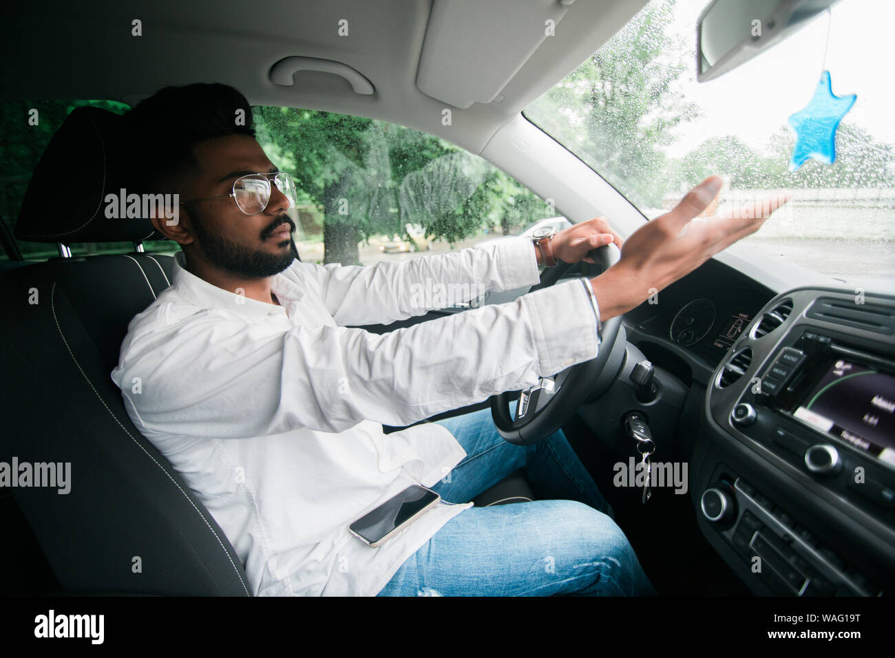traffic jam - angry stressed businessman driving car Stock Photo - Alamy