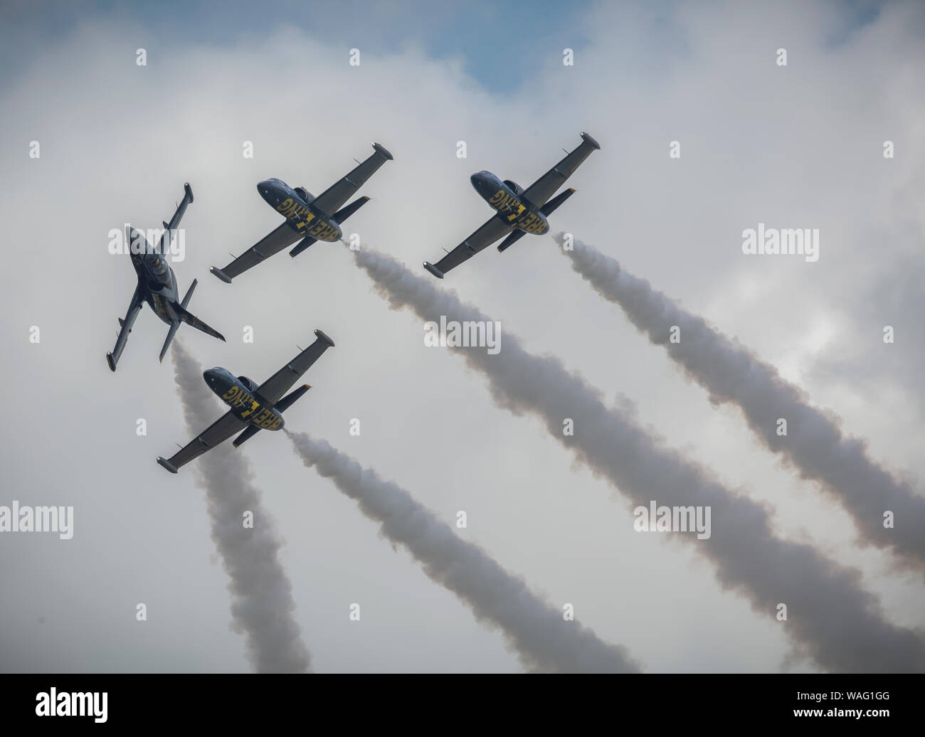 Four Breitling Aerobatics Team Albatris L-39 planes with white smoke ...