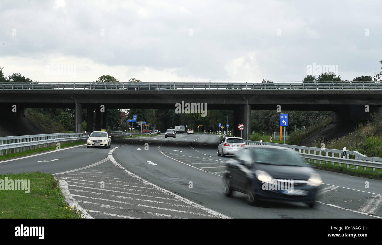 Zetel, Germany. 20th Aug, 2019. Cars drive through Zetel under the ...