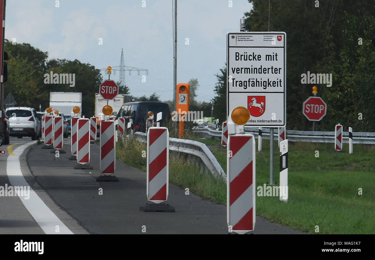 Zetel, Germany. 20th Aug, 2019. A truck drives past a sign "Brücke mit ...