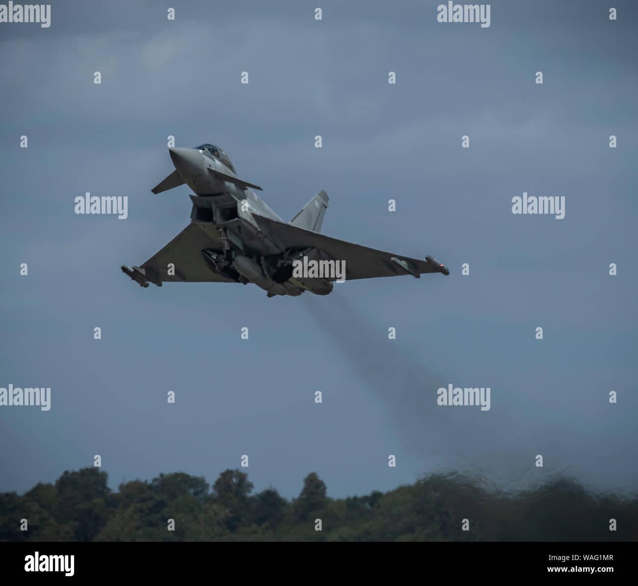 RAF Eurofighter Typhoon Jet taking off with smoke behind it and the top ...
