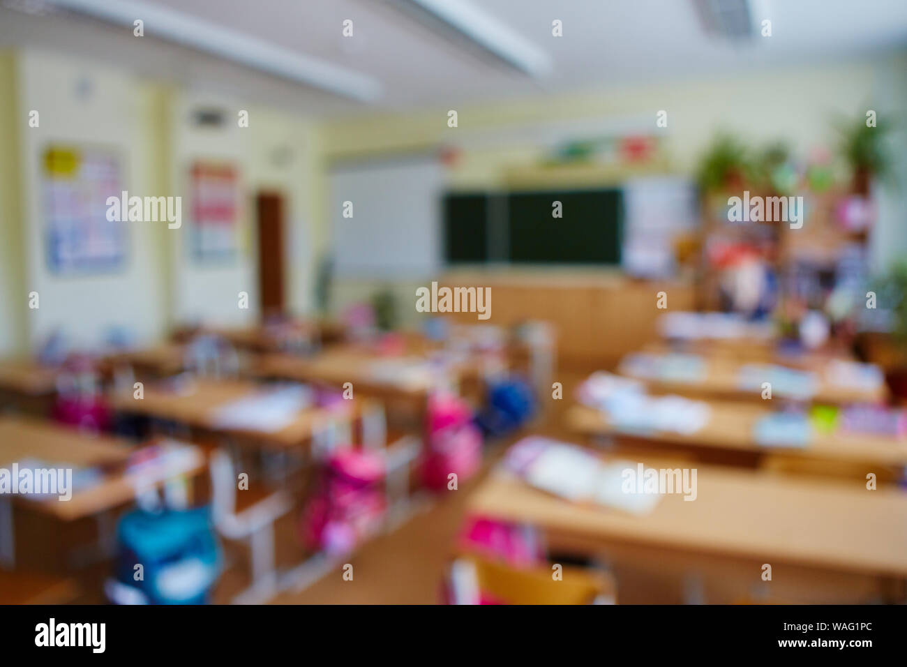 Classroom in a blurred background with no children. Students left their ...