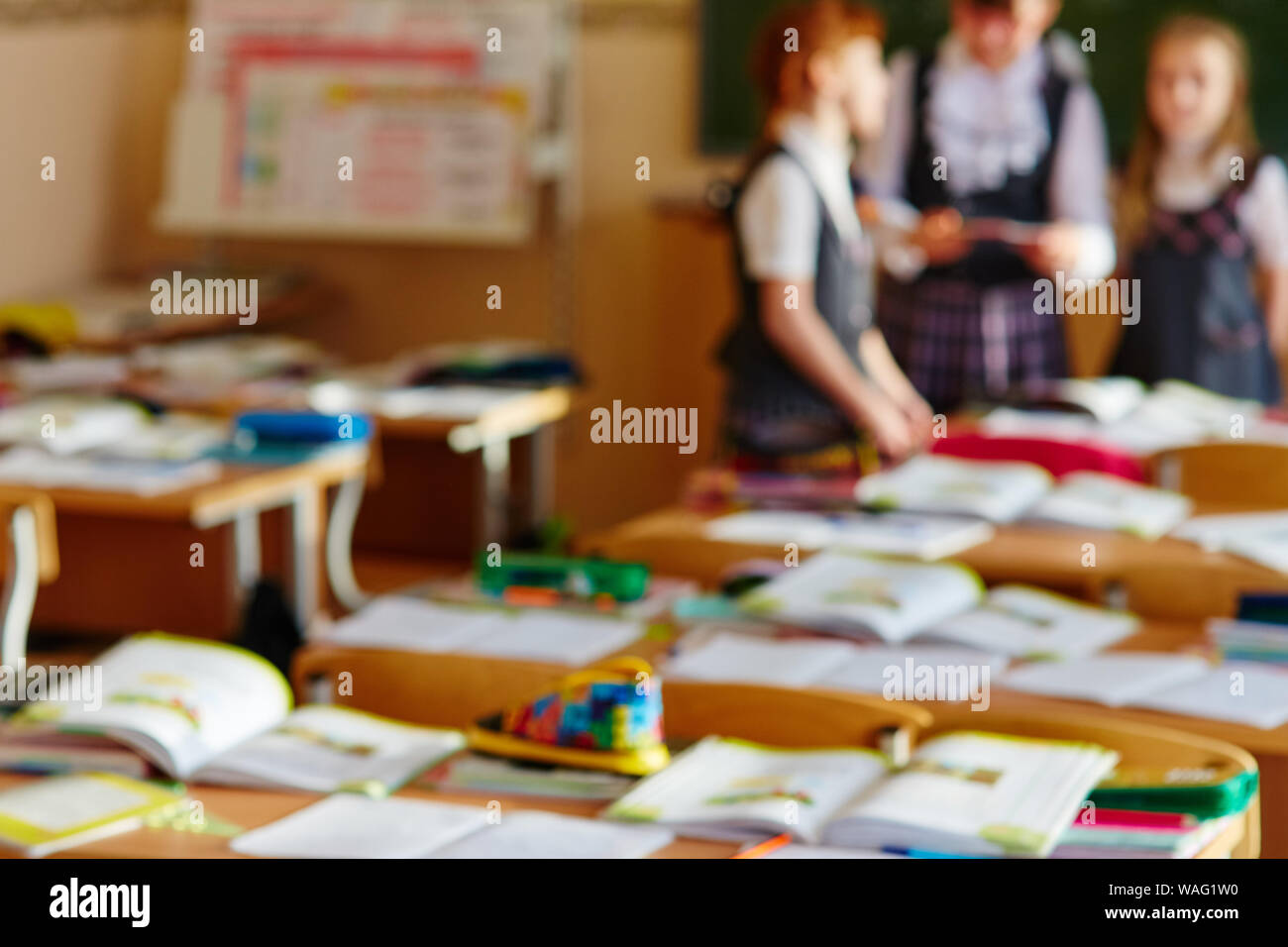 A group of primary school students communicate during the break ...