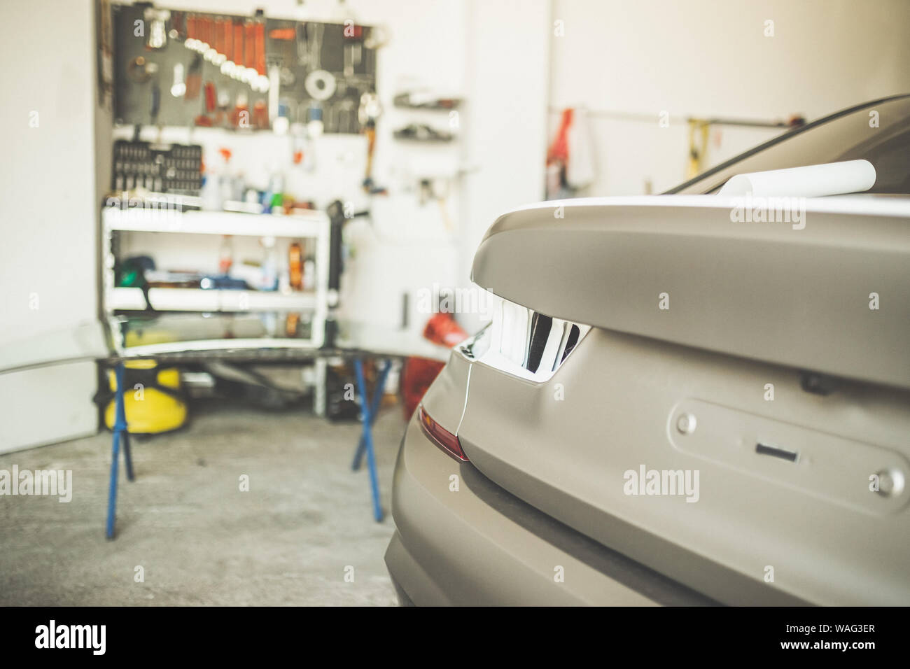 Rear view of car in repair station Stock Photo - Alamy