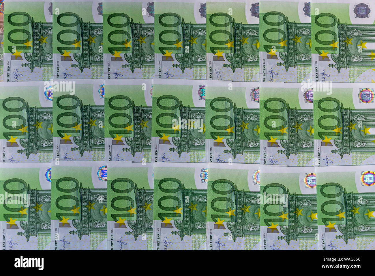 Banknotes 100 euros euro money beautifully laid out. Top view ...