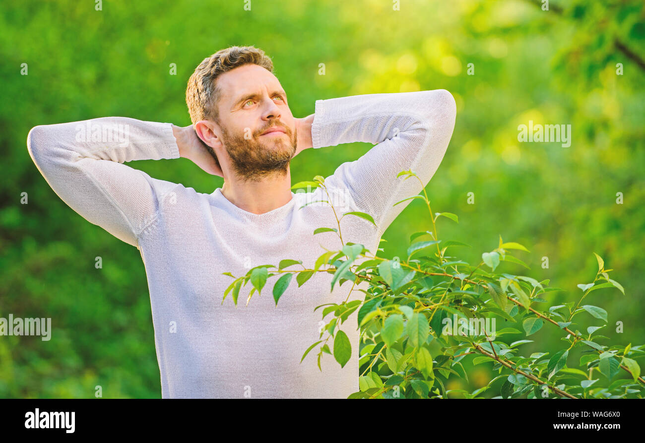 time to relax. man relax in forest. relaxation. ecological life for man ...