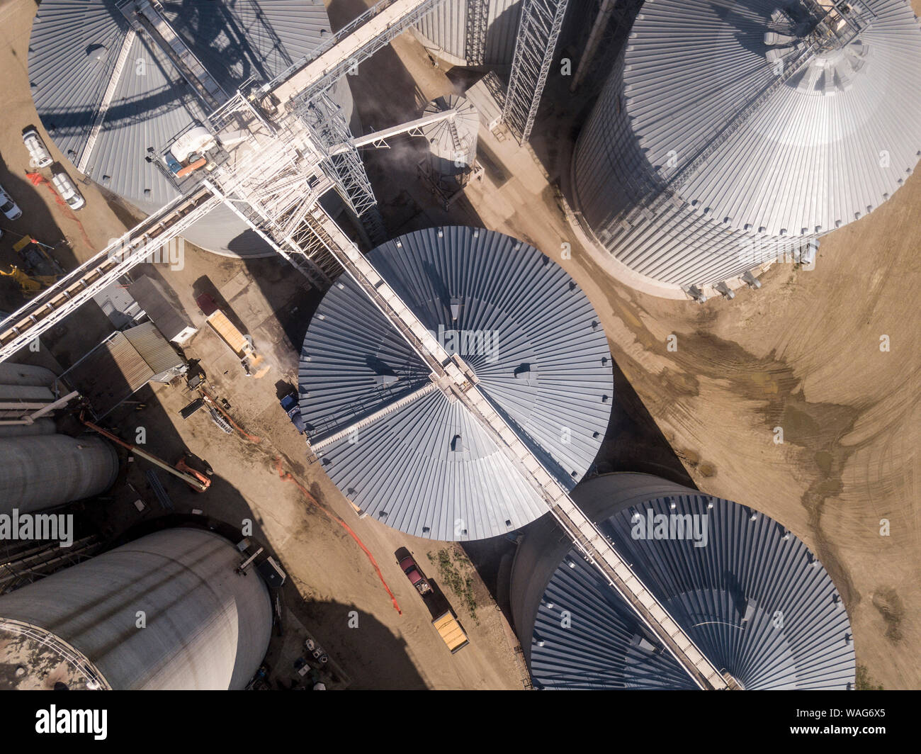 Aerial high angle view of industrial grain elevators and dryers in ...