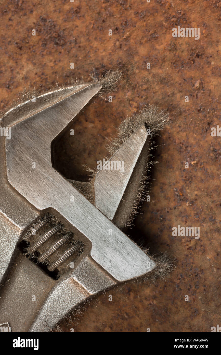 Wide jaw adjustable iron tempered metal spanner, wrench, covered in ...