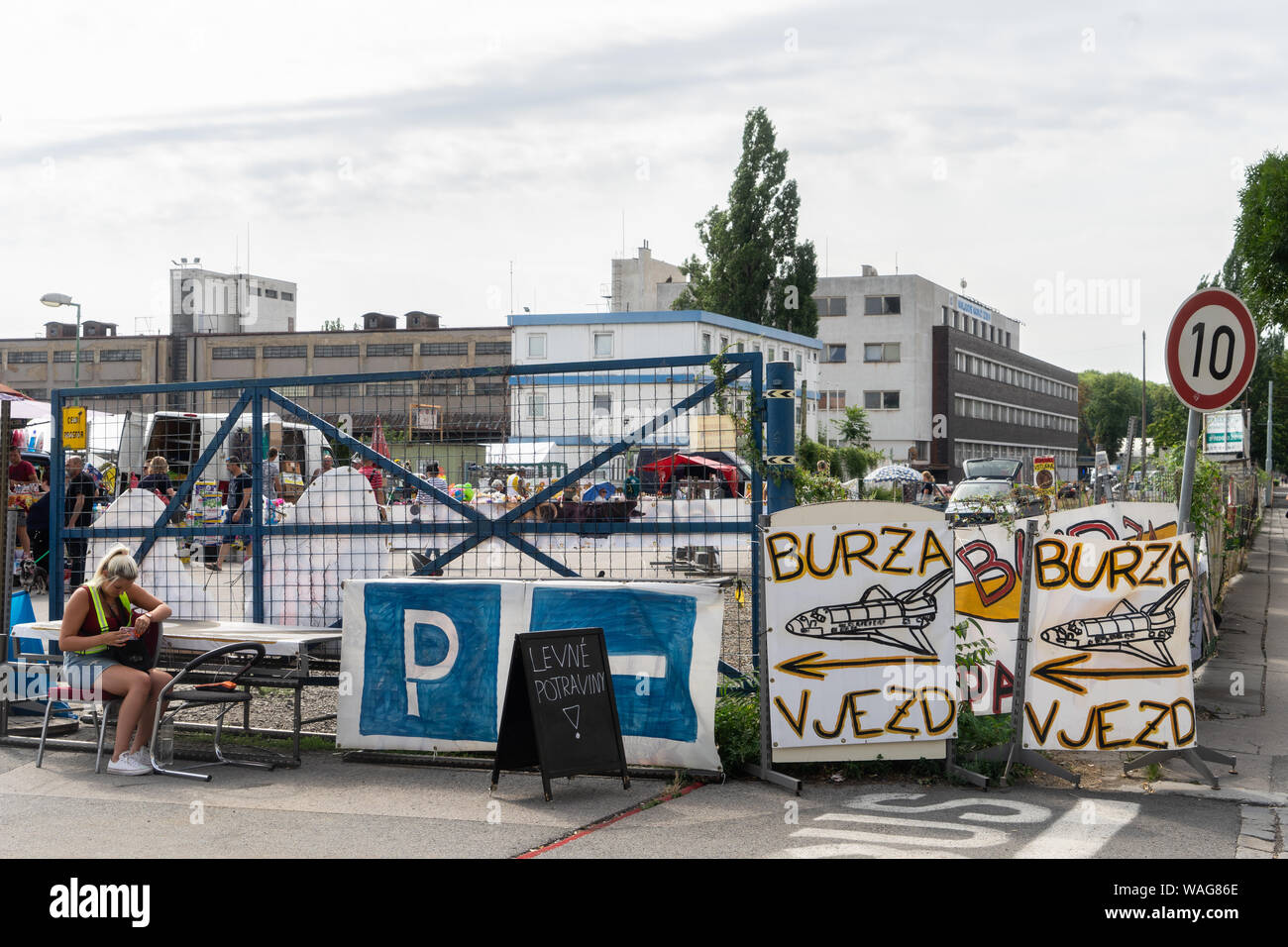 Weekend flea market in front of freight railway station Zizkov, Prague ...