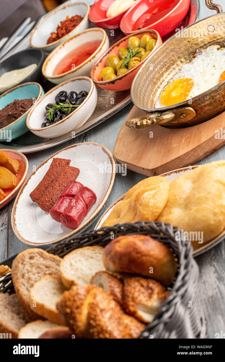 Traditional Turkish Breakfast served with traditional turkish tea on ...