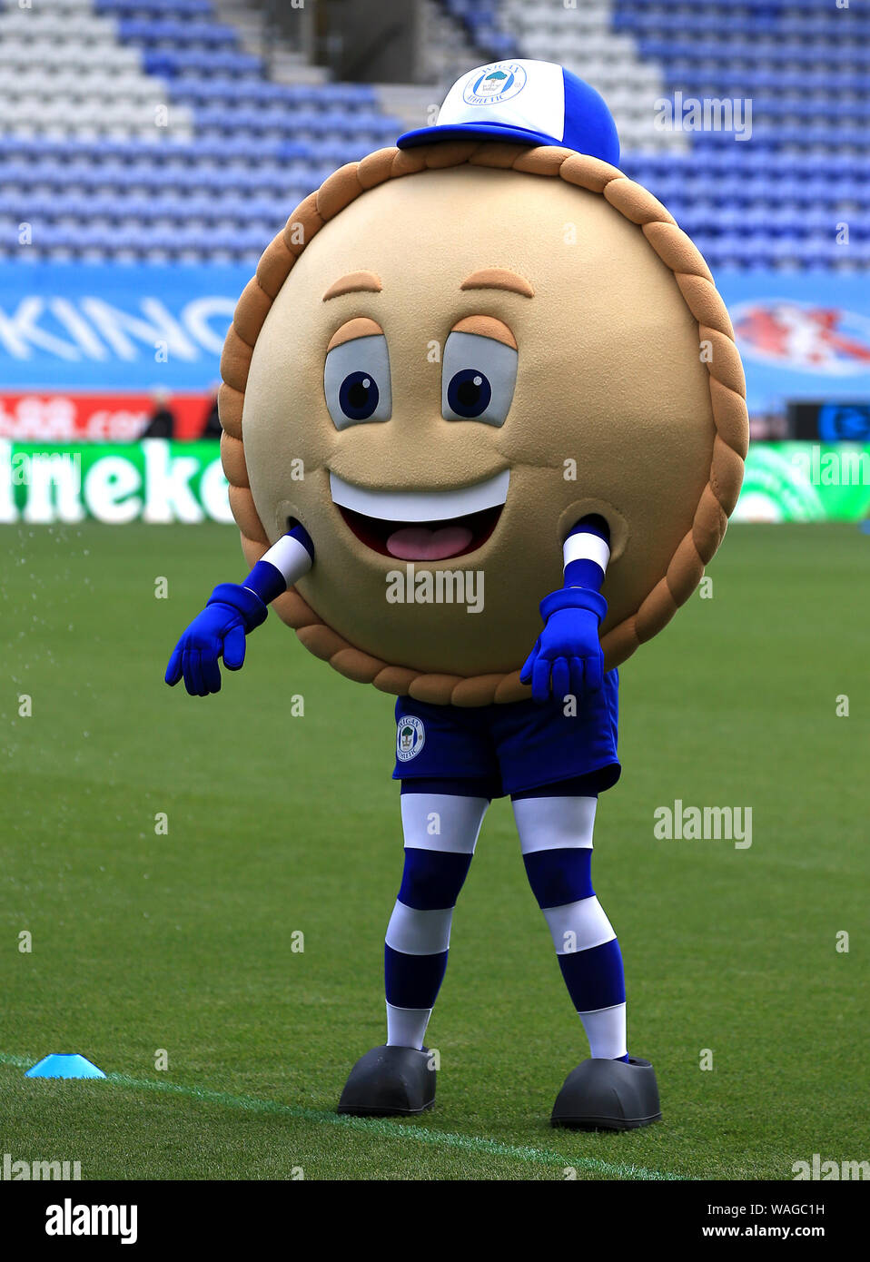 Wigan Athletic mascot Crusty The Pie entertaining fans before the game ...