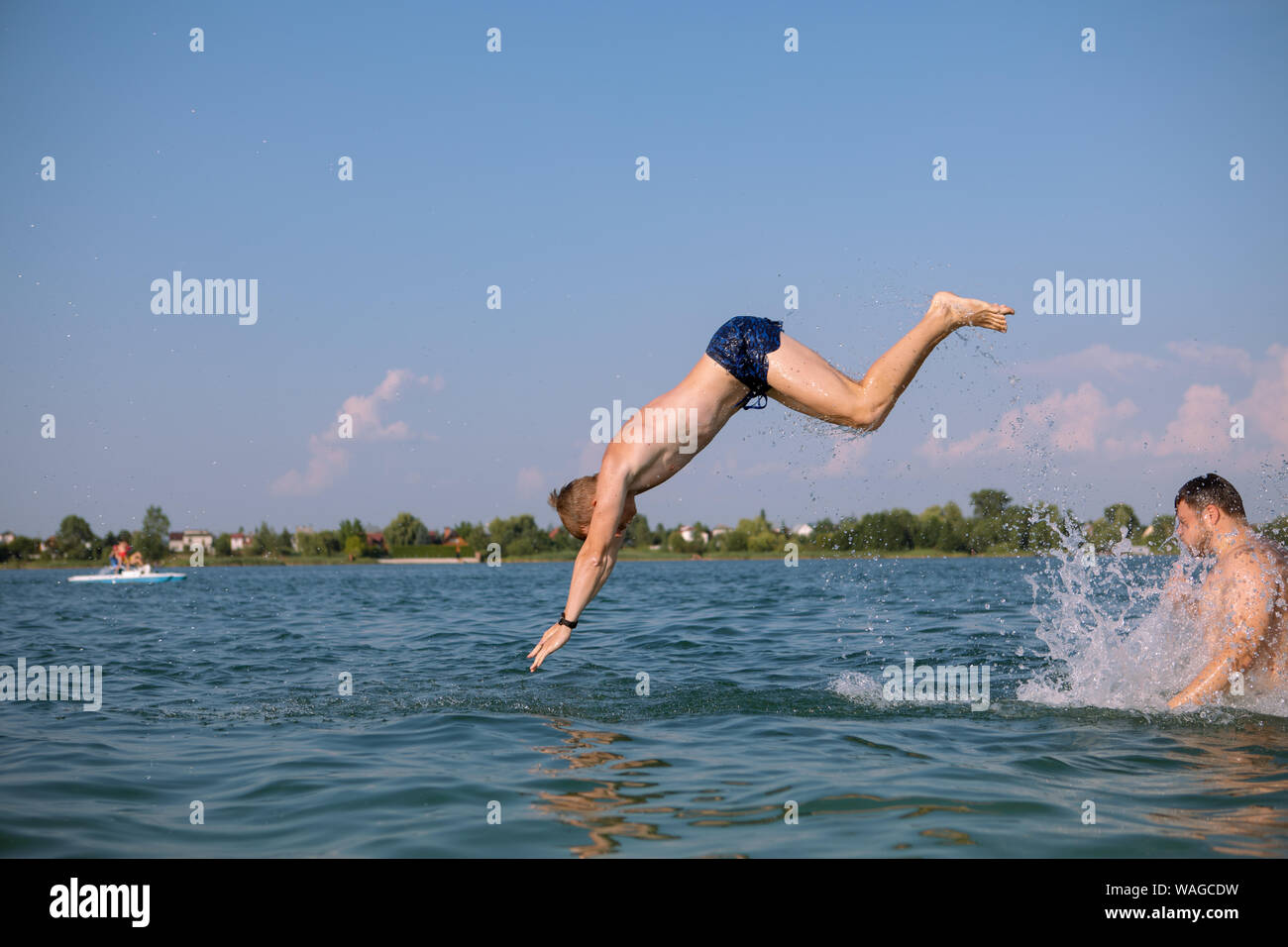 Couple jumping lake hi-res stock photography and images - Alamy